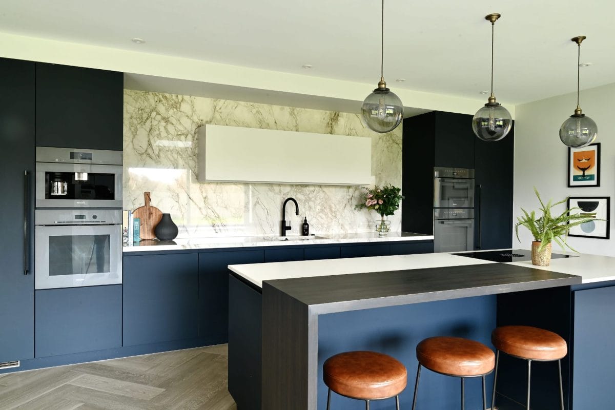 Stunning Navy Blue Kitchen with Marble Splashback - Classic Interiors