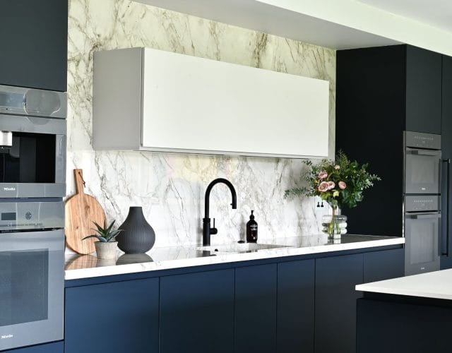 Stunning Navy Blue Kitchen with Marble Splashback - Classic Interiors