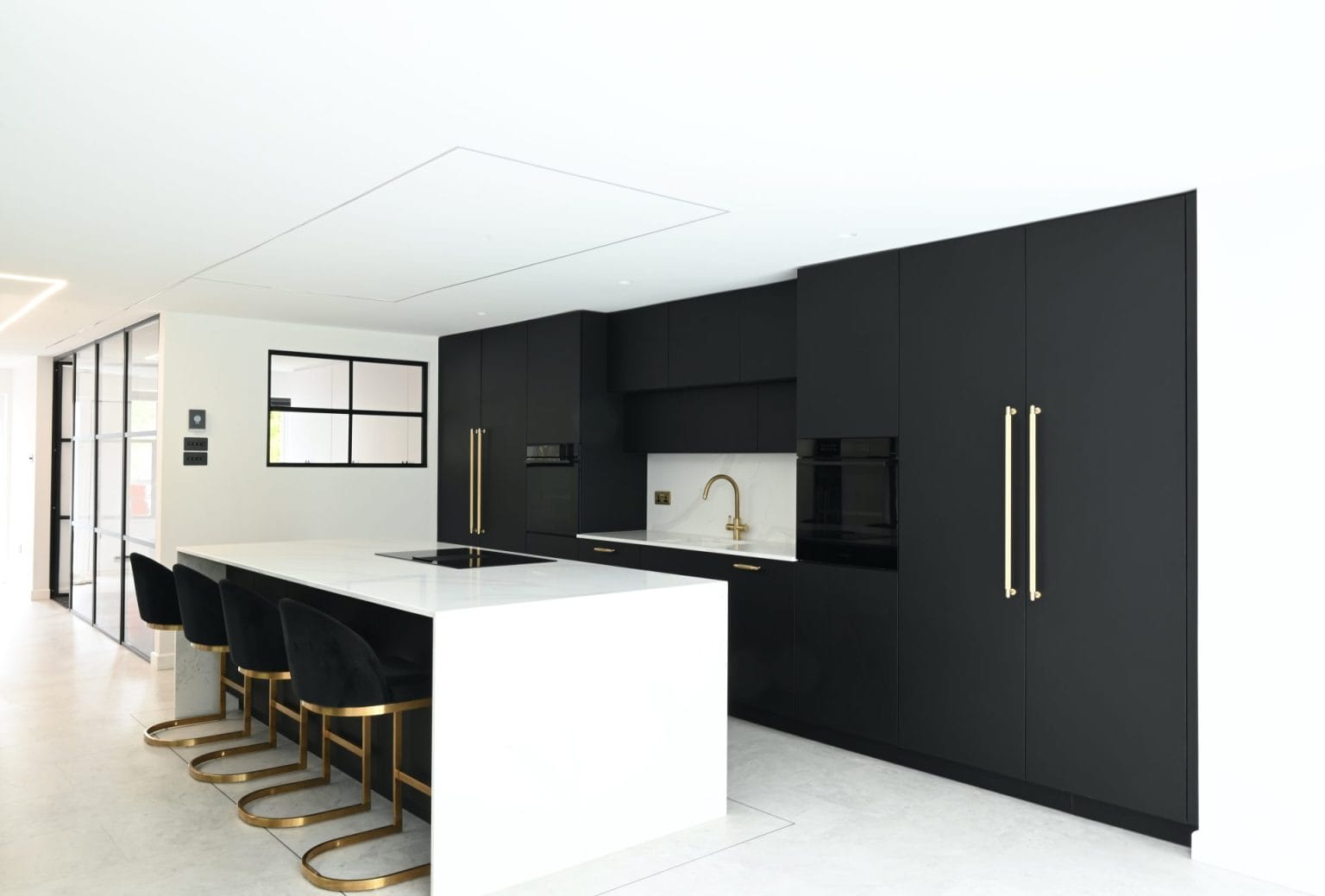 Modern Black German Kitchen with Brass Handles - Classic Interiors