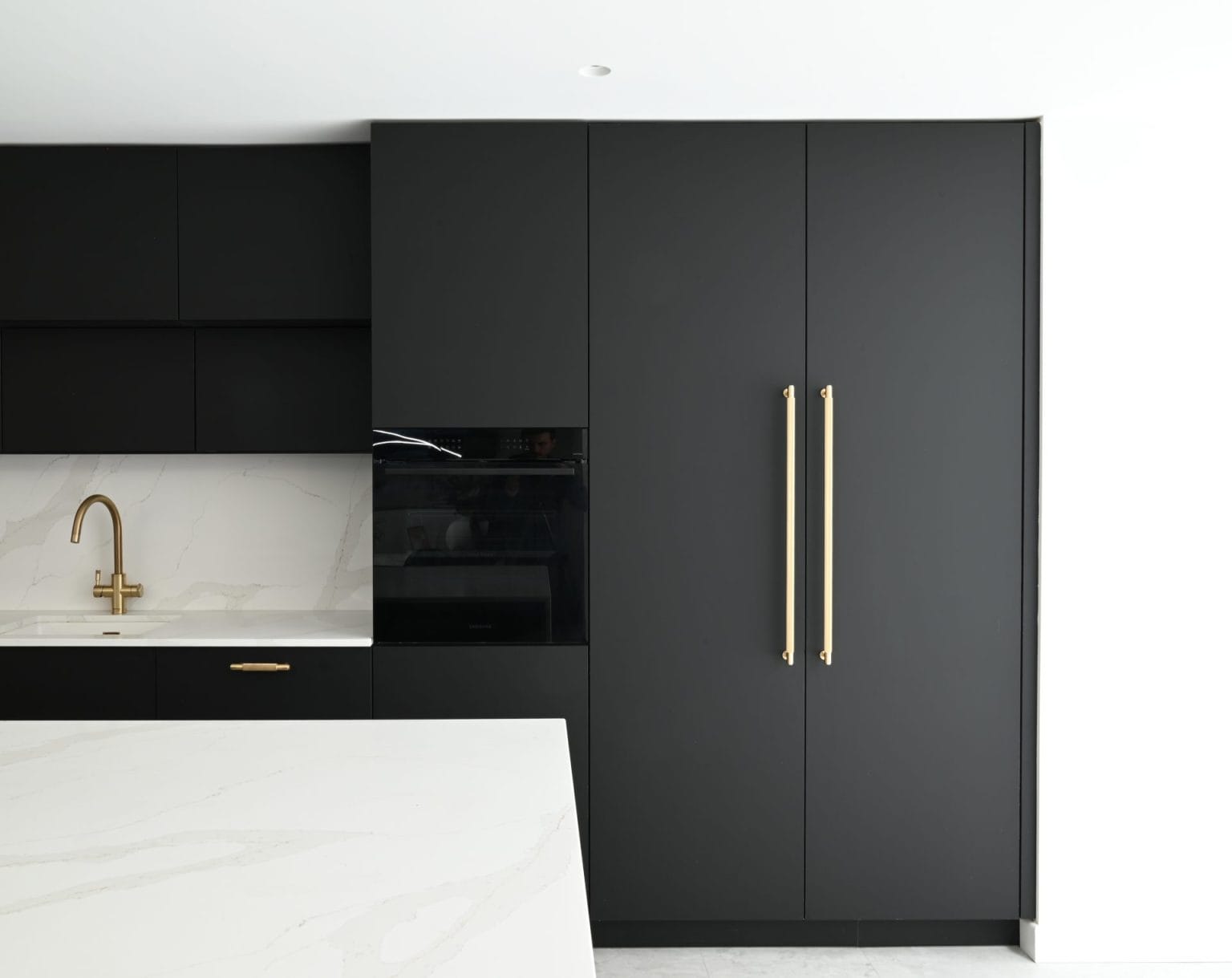Modern Black German Kitchen with Brass Handles - Classic Interiors