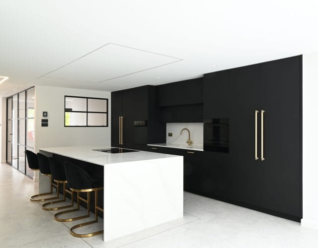 Modern Black German Kitchen with Brass Handles - Classic Interiors
