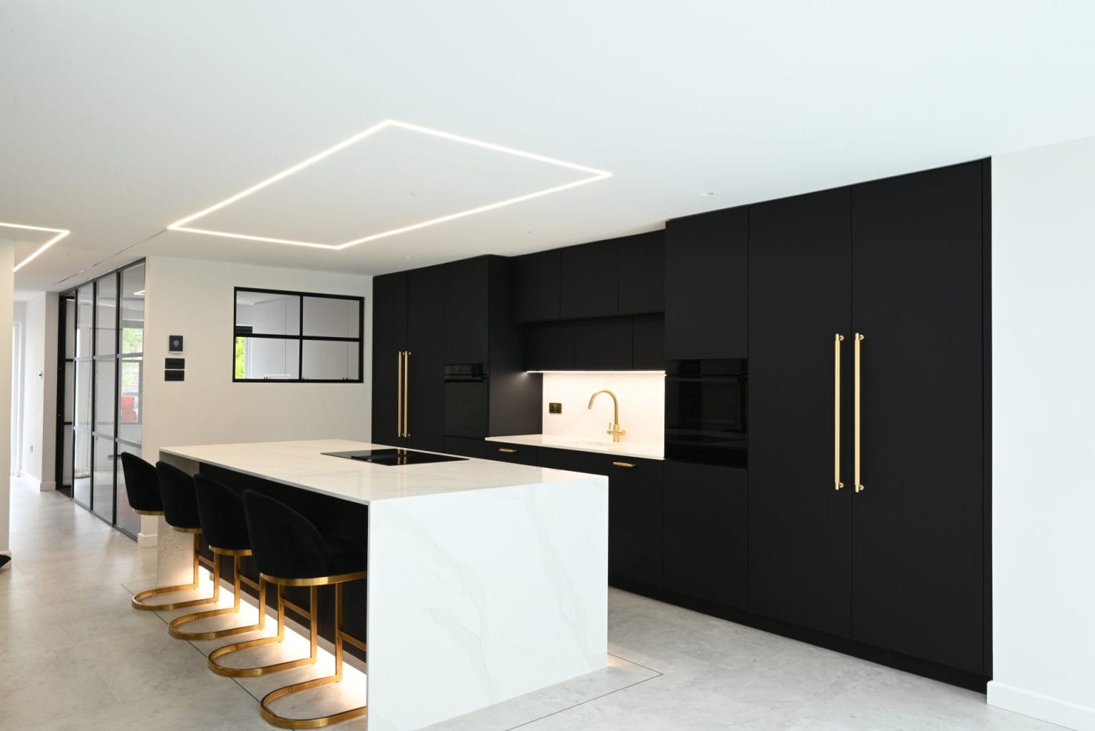 Modern Black German Kitchen with Brass Handles - Classic Interiors